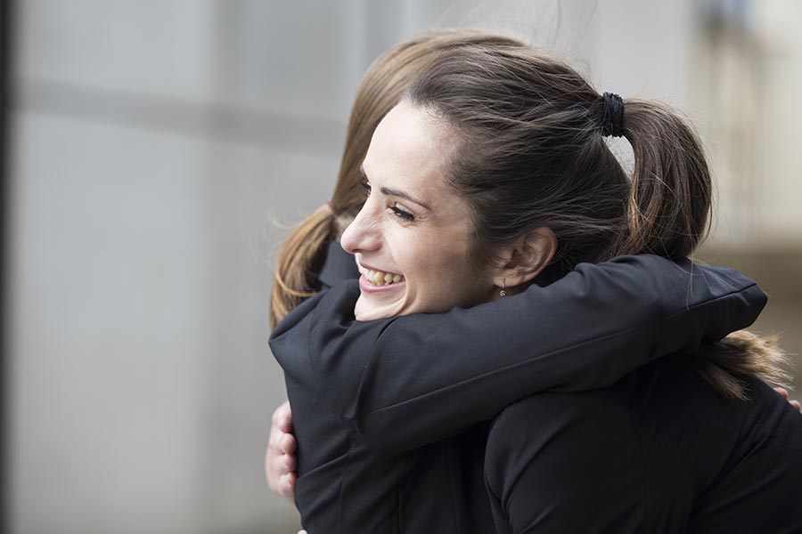 Office hugging trend not everyone's cup of tea, report finds ...