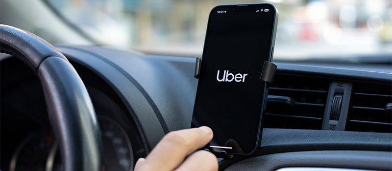 Uber faces legal battle over use of AI to set driver pay | Compensation ...